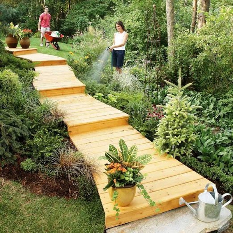 14 Easy To Make DIY Pallet Walkway Ideas - Susie Harris